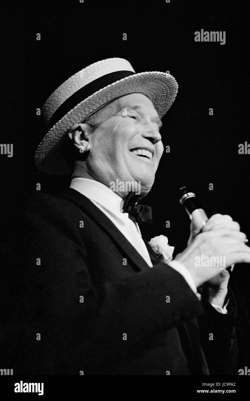 French singer Maurice Chevalier on the stage of the restaurant Maxim's ...