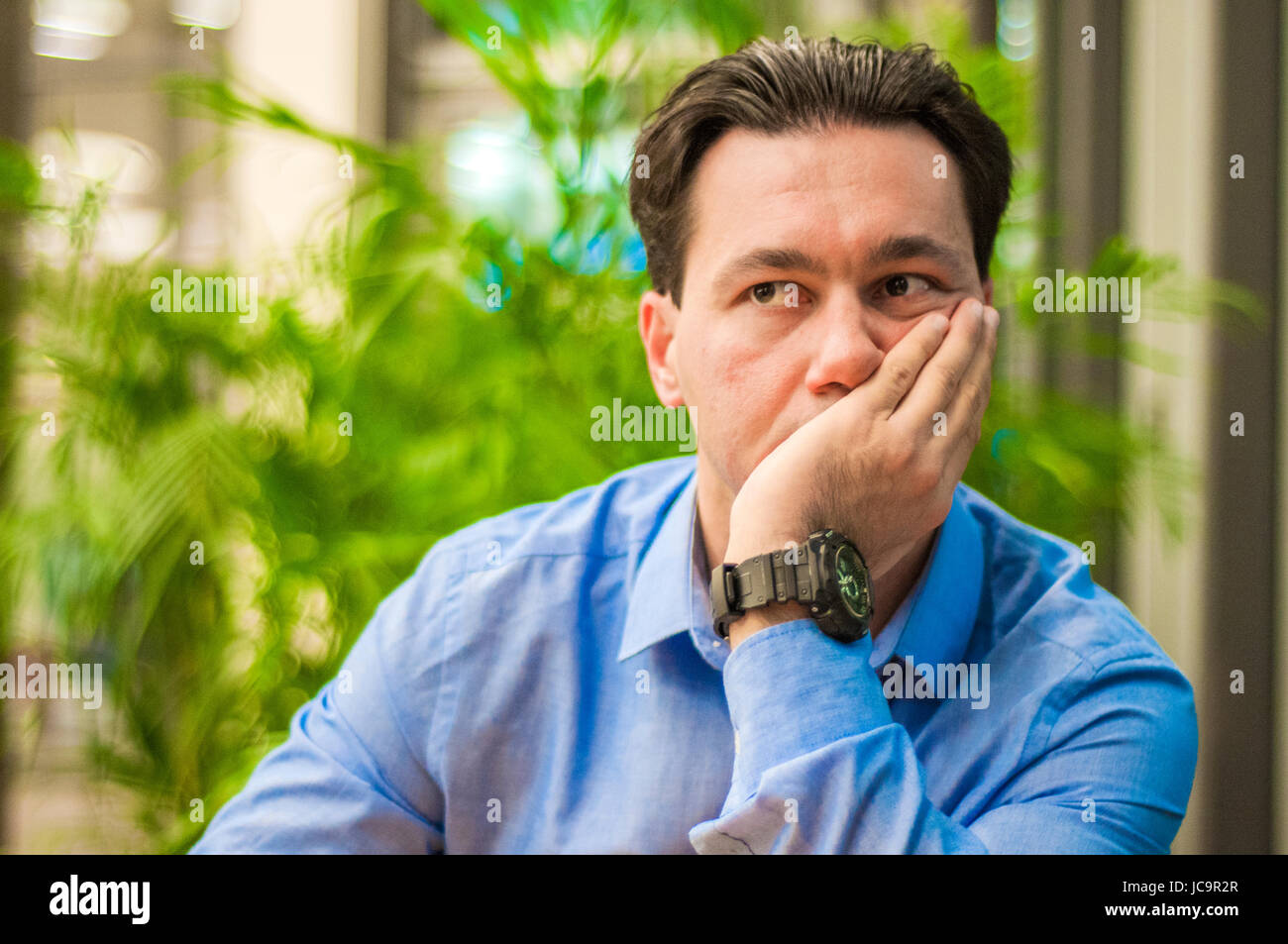 Work exhaustion handsome young hi-res stock photography and images - Alamy
