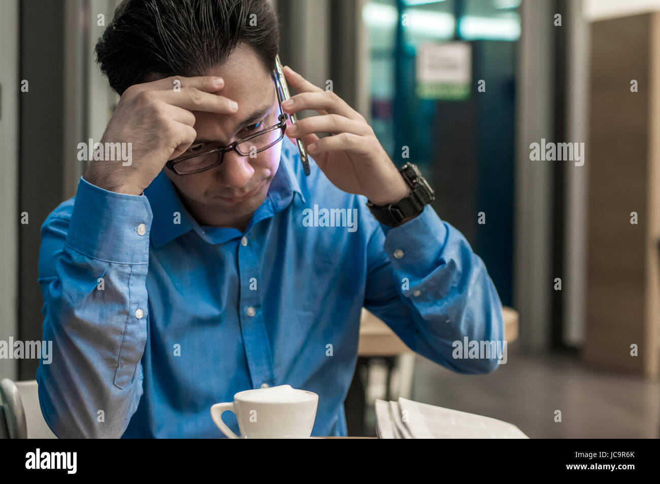 Depressed businessman in the coffee shop. Stressed businessman Stock ...