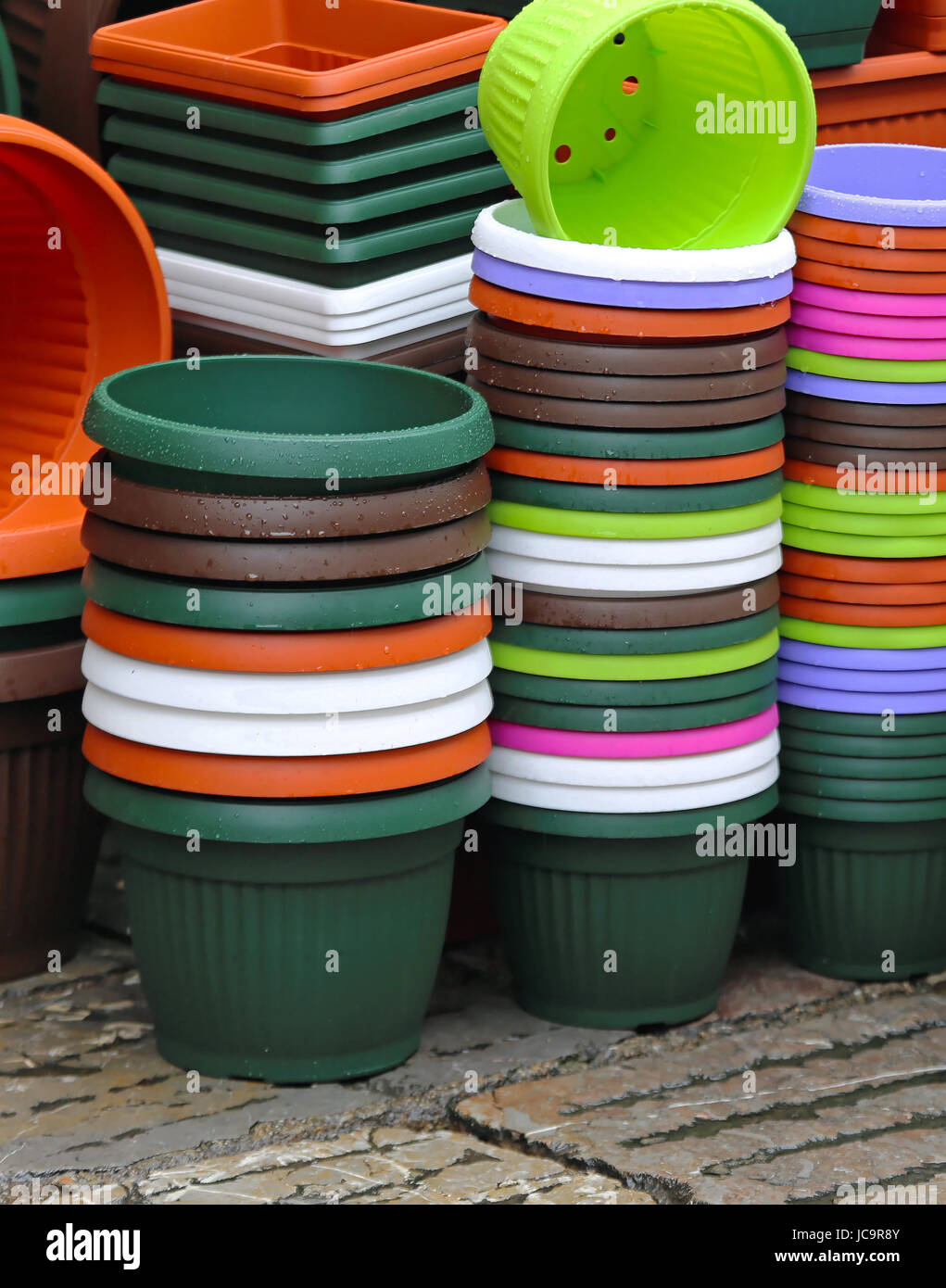 New color plastic pots gardening equipment Stock Photo - Alamy