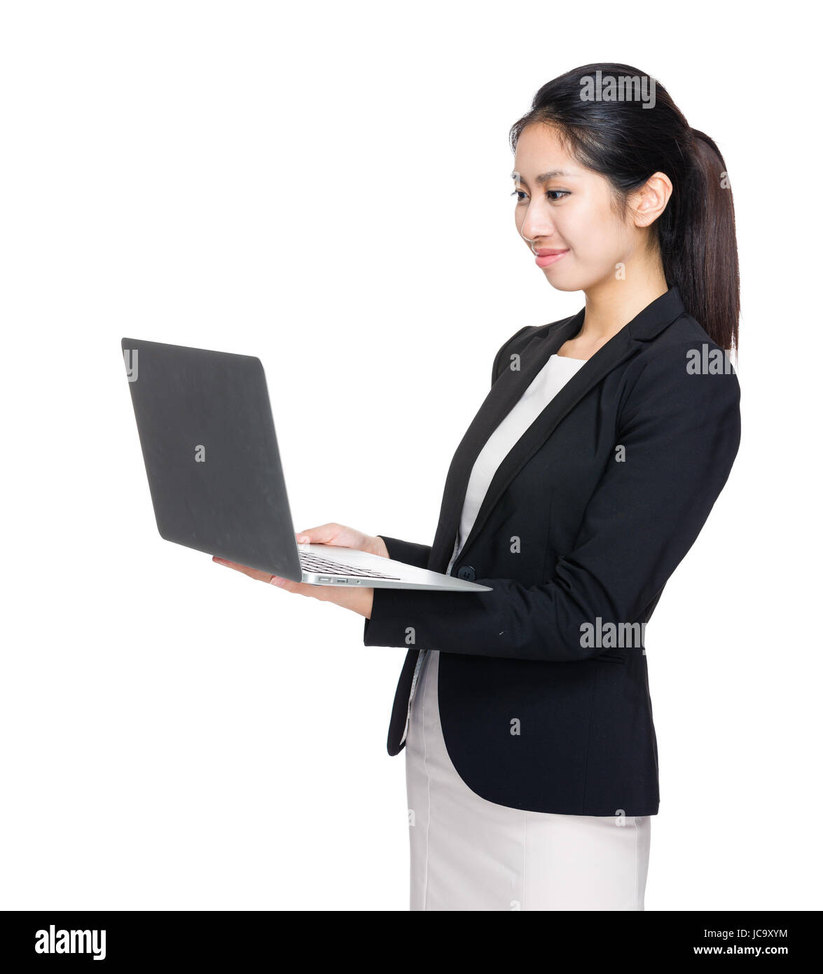 Business woman look at computer Stock Photo - Alamy