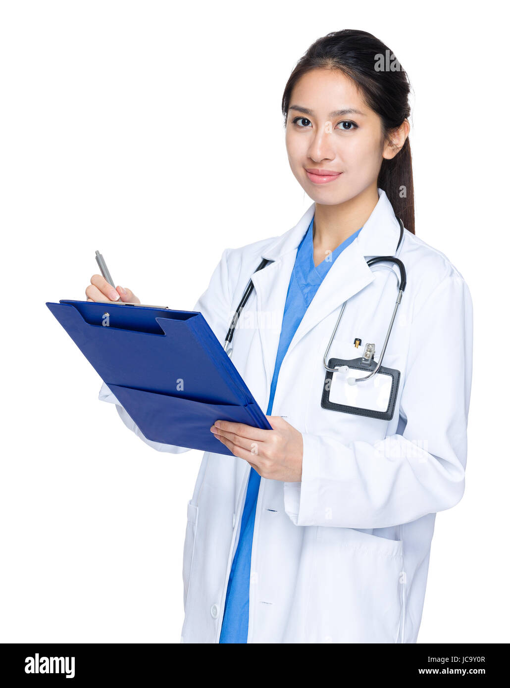 Asian doctor write on clipboard Stock Photo - Alamy