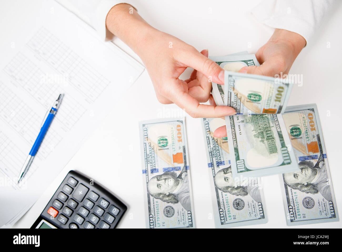 Hands counting money, close up Stock Photo - Alamy