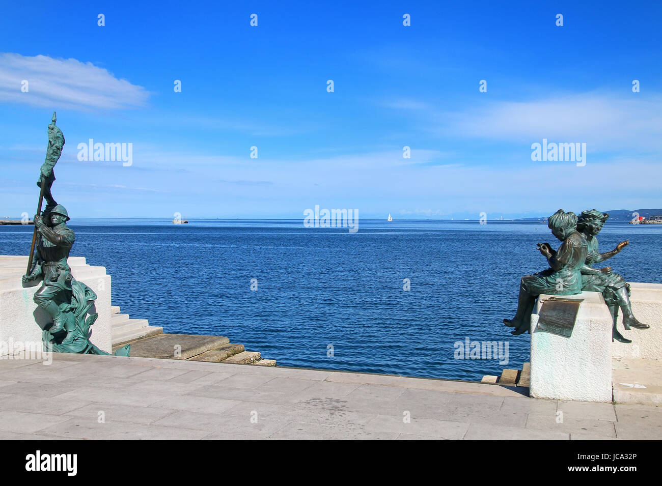 Bronze statues at the waterfront in Trieste, Italy. Trieste is the ...