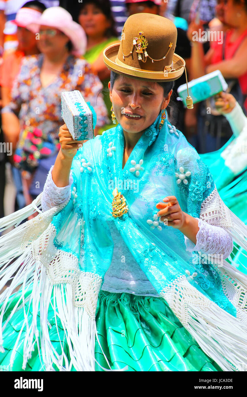 Local woman performing during Festival of the Virgin de la Candelaria ...