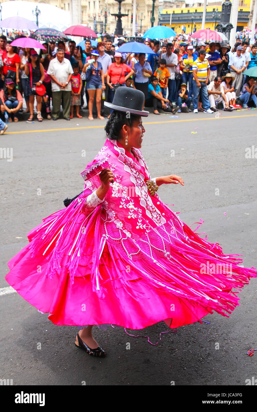 Local woman performing during Festival of the Virgin de la Candelaria ...