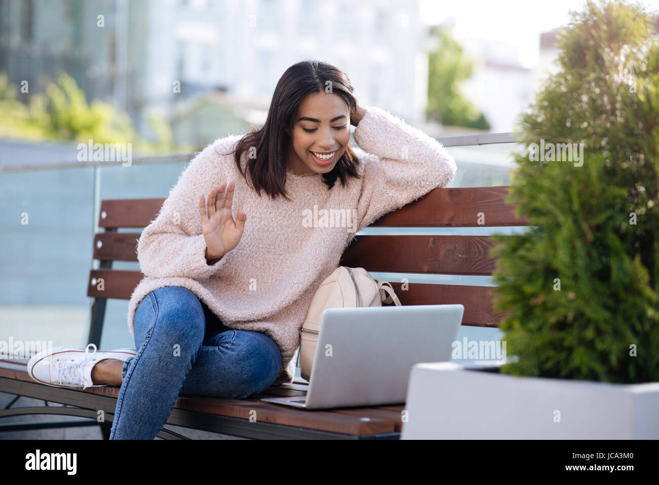 Energetic fancy girl chatting with her friend online Stock Photo - Alamy