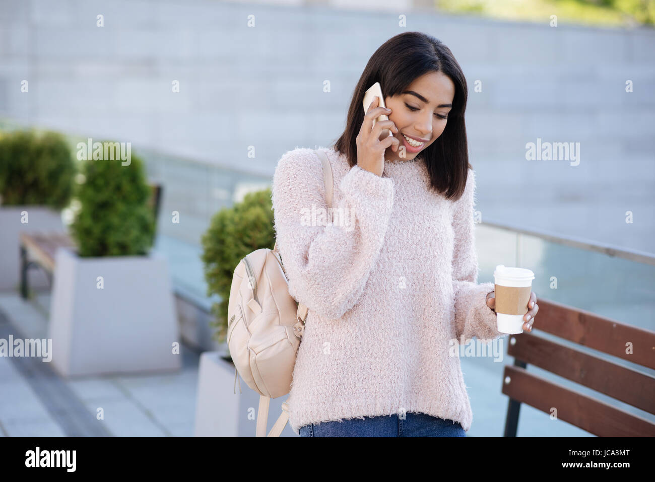 Cool active girl inviting her friend for a walk Stock Photo - Alamy