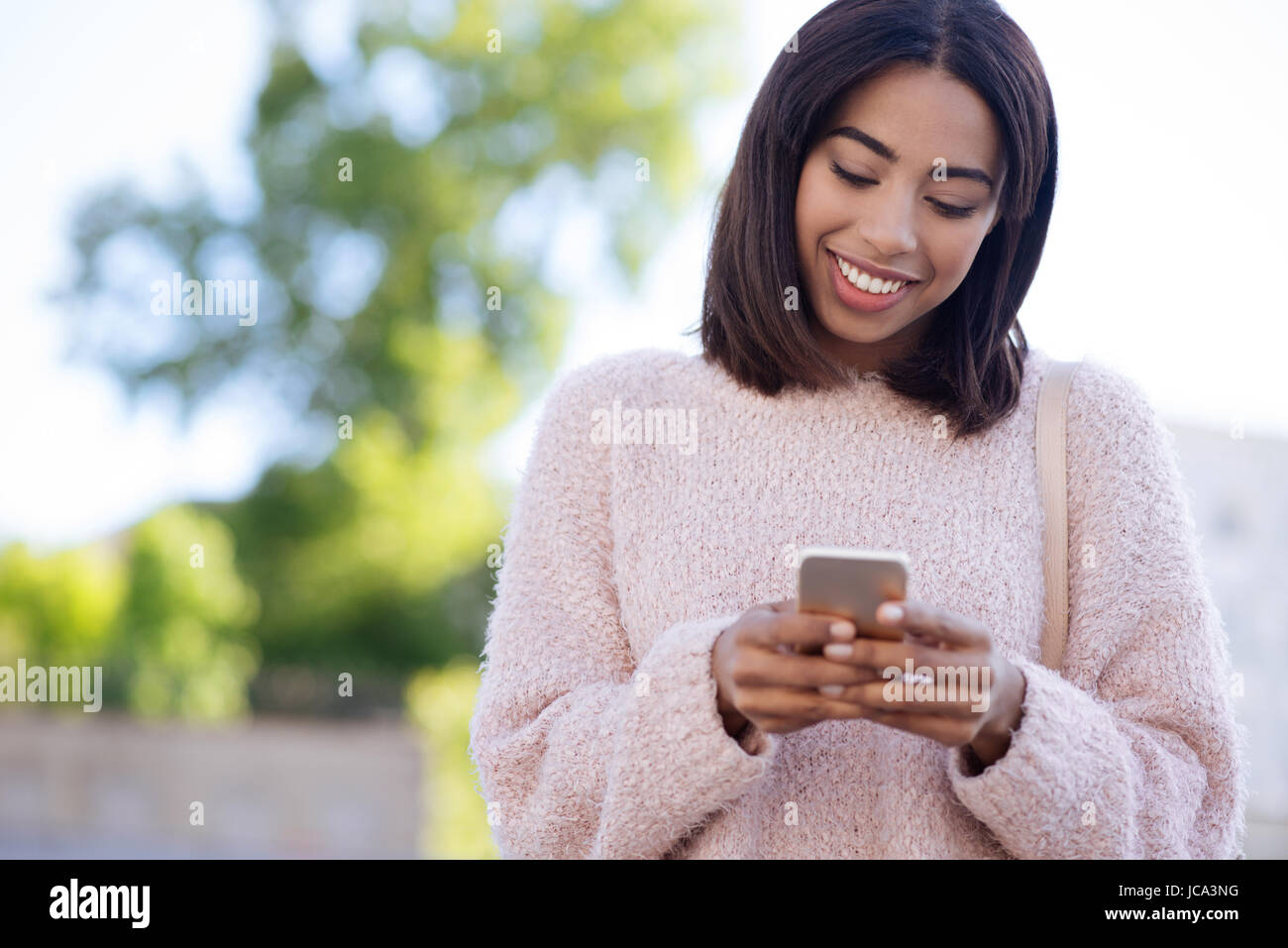 Dynamic Inspired Woman Typing A Text Message Stock Photo Alamy dynamic-inspired-woman-typing-a-text-message-stock-photo-alamy