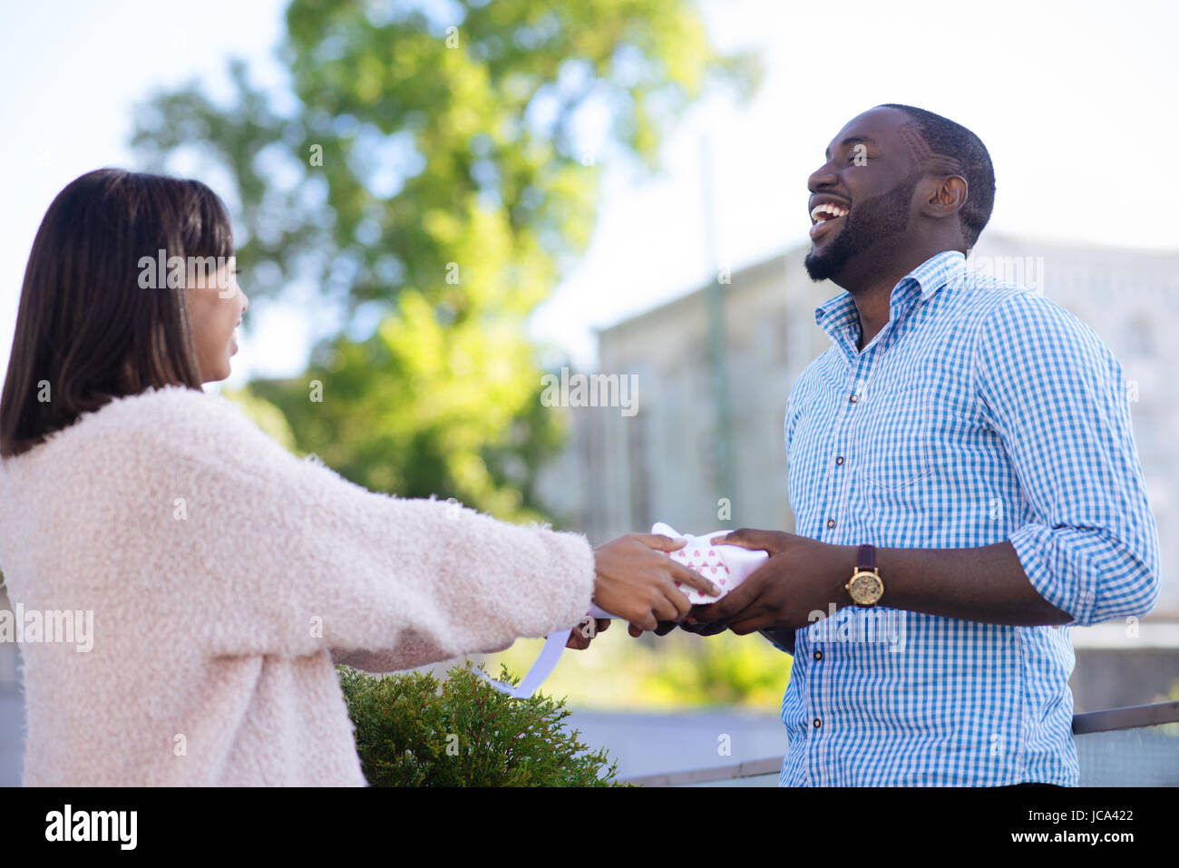 Positive pretty girl making a regular day feeling special Stock Photo ...