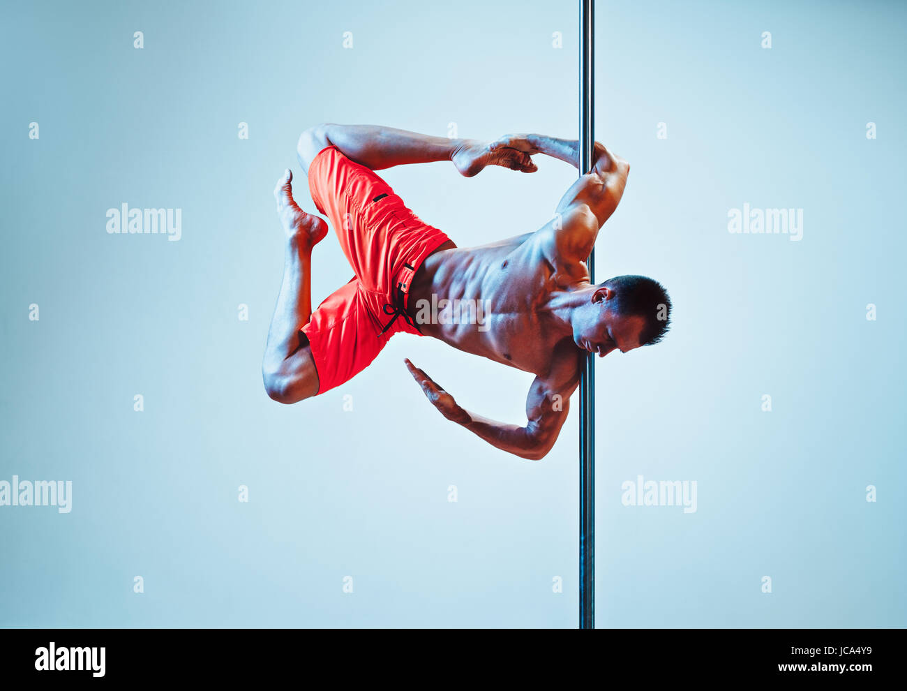 Male pole dancer hi-res stock photography and images - Alamy