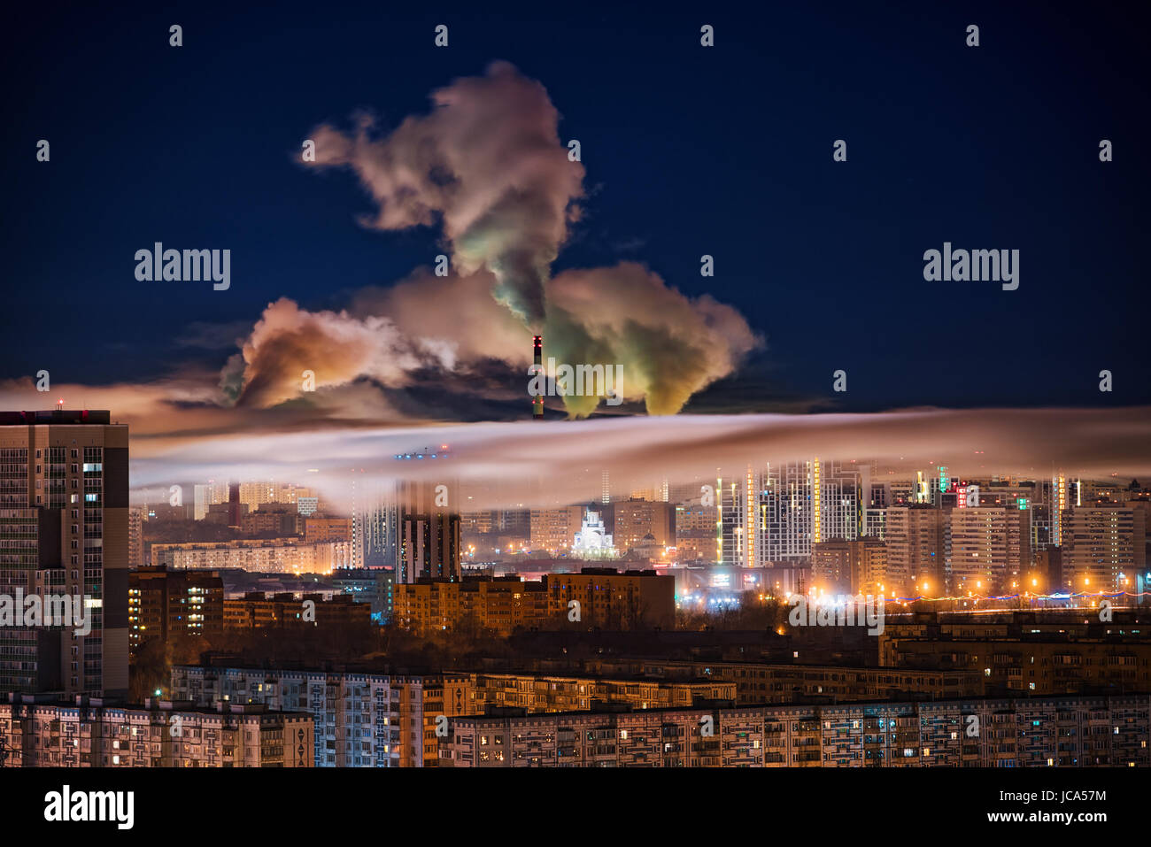 Smoke and haze over city at night at very cold winter weather Stock ...