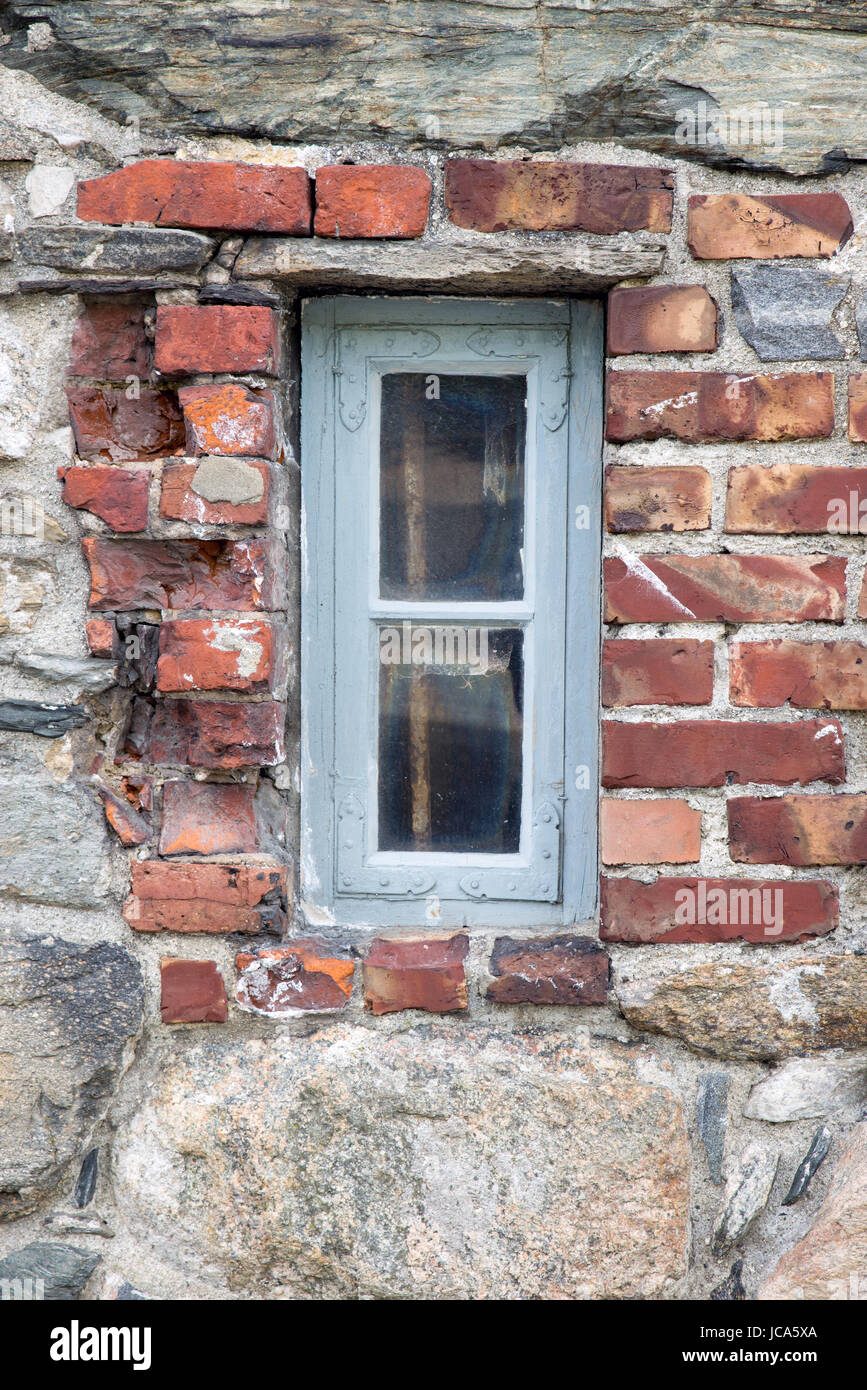 Narrow window in a stone wall Stock Photo - Alamy