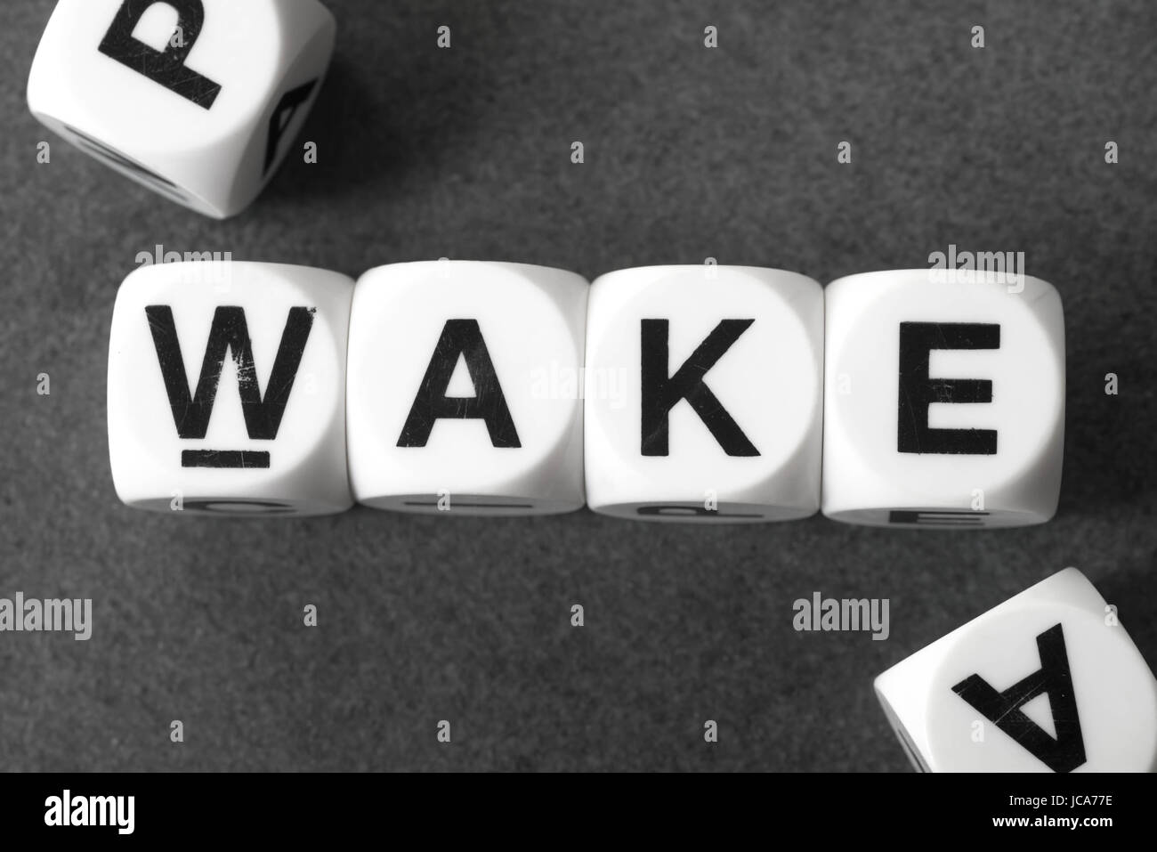 word wake on white toy cubes Stock Photo - Alamy