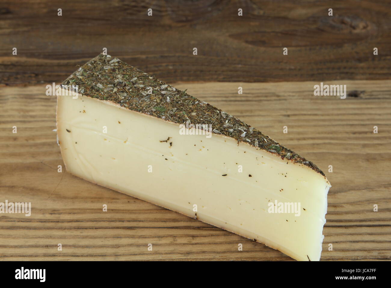 Traditional Swiss Cheese on wooden table Stock Photo - Alamy