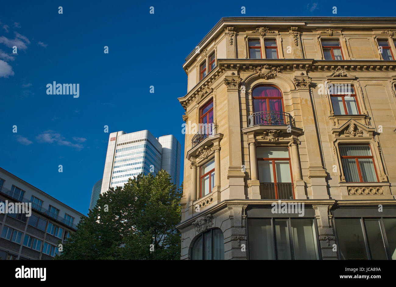 New DB offices in high rise building behind older low rise apartment ...