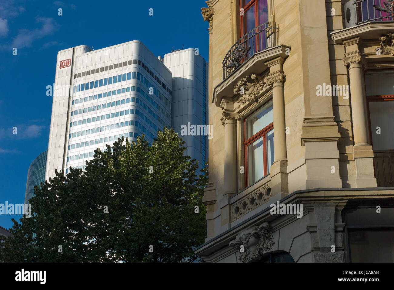 New DB offices in high rise building behind older low rise apartment ...