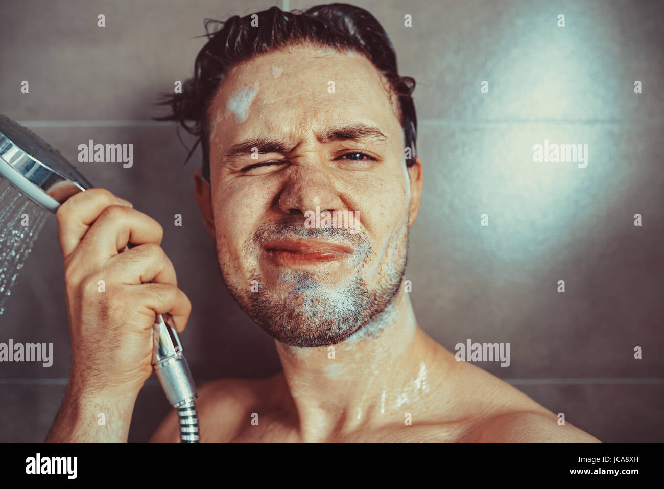 Man shower washing hi-res stock photography and images - Alamy