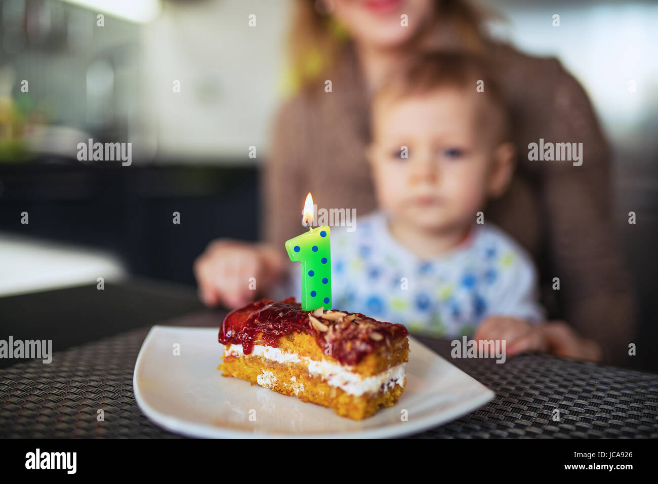 One year baby celebrating birthday. Focus on cake with candle Stock ...