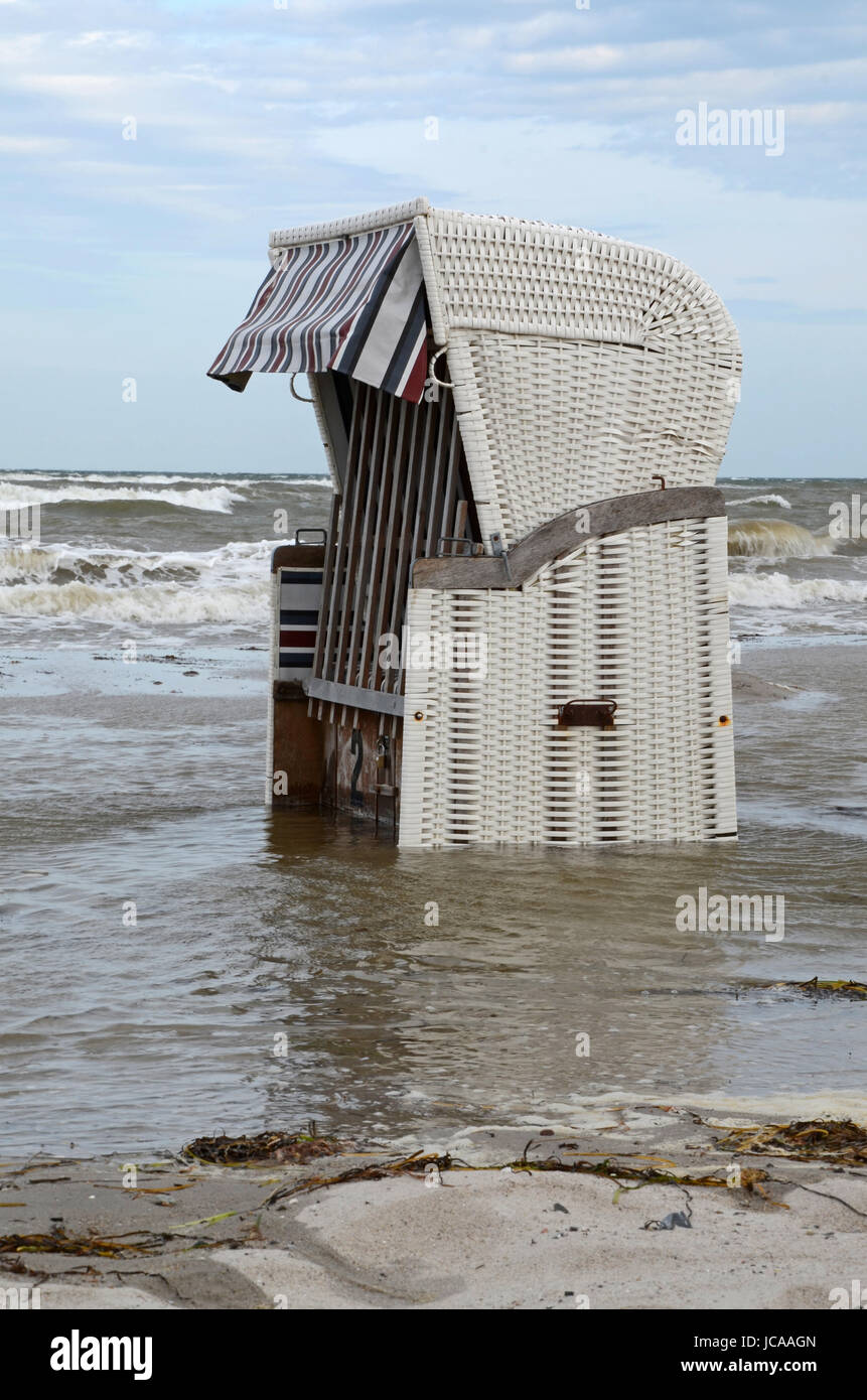 high tide beach chair Stock Photo - Alamy