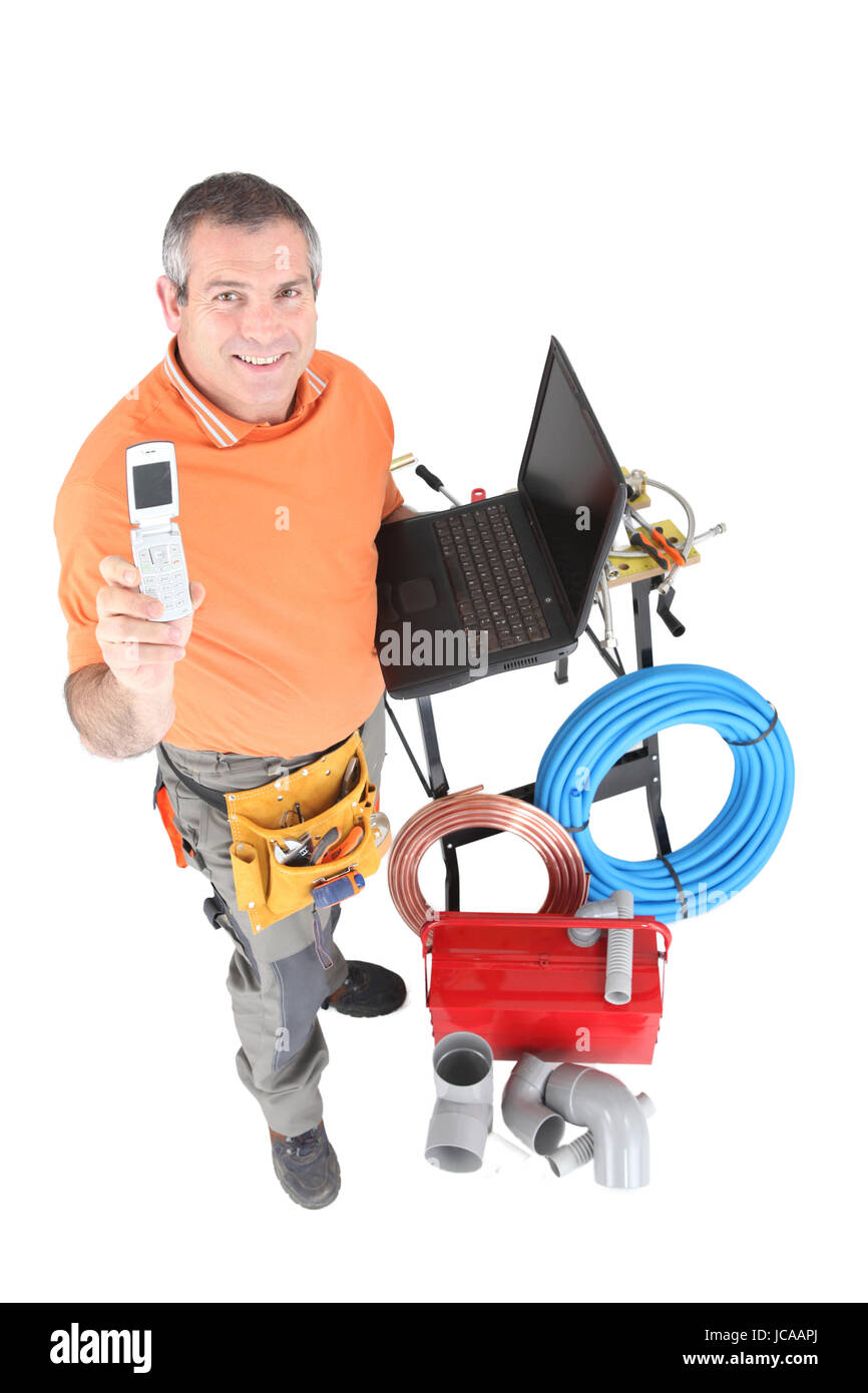 plumber showing phone Stock Photo - Alamy