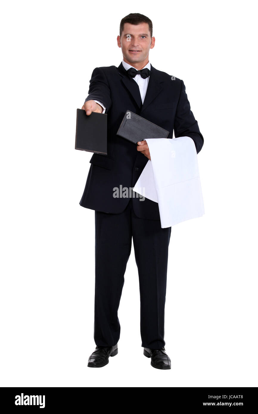 Waiter offering a menu Stock Photo - Alamy
