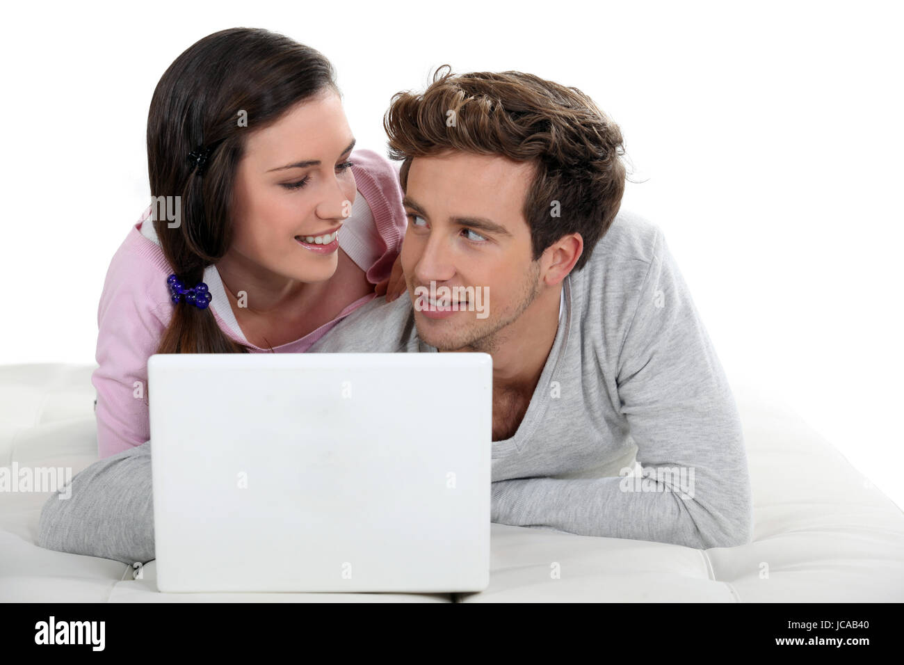 Couple surfing the internet Stock Photo - Alamy
