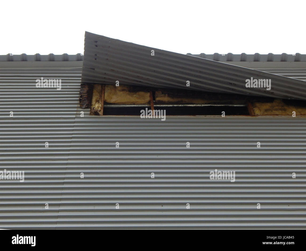 Torn by the wind Profiled metal sheet Stock Photo - Alamy