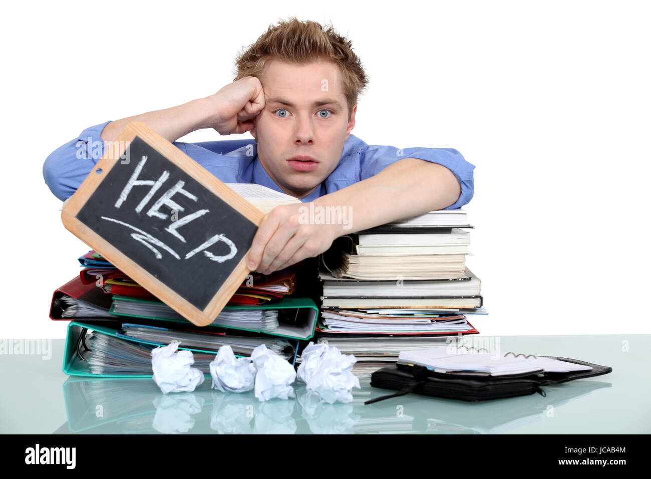 An overworked office worker Stock Photo - Alamy