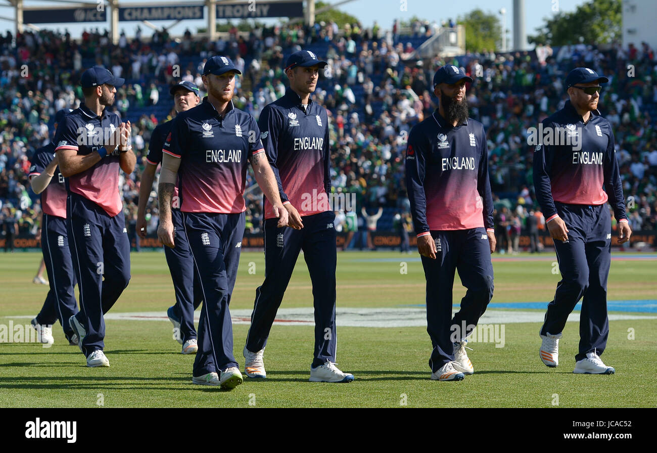 England players walk off dejected after defeat in the ICC Champions ...