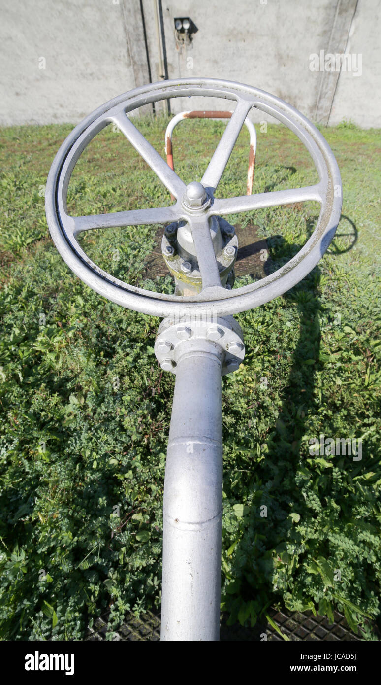 Large tap with pipe closure valve in a industrial plant Stock Photo - Alamy