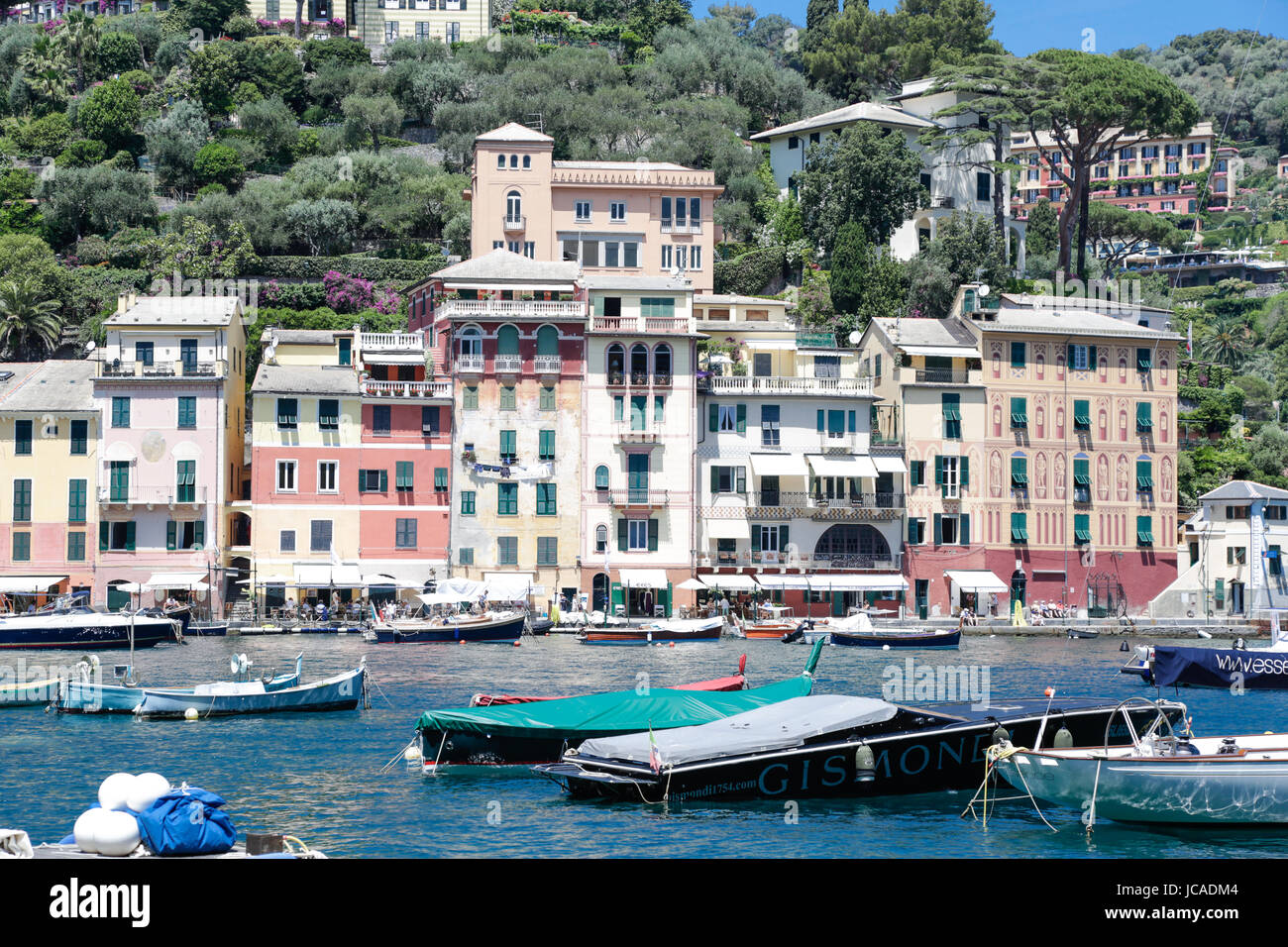 Portofino harbor with colorful and historical houses in the background ...