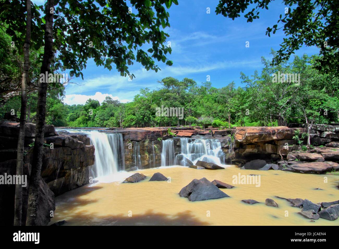 Turbid water stream in early rainy season at Tat Ton Waterfall during ...