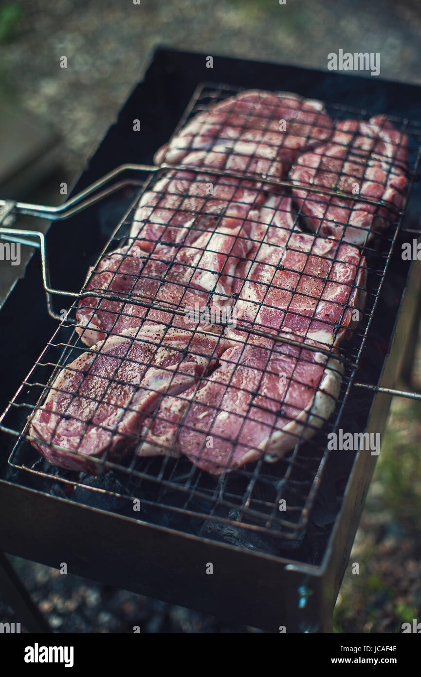 Grilling fresh entrecote pork Stock Photo - Alamy