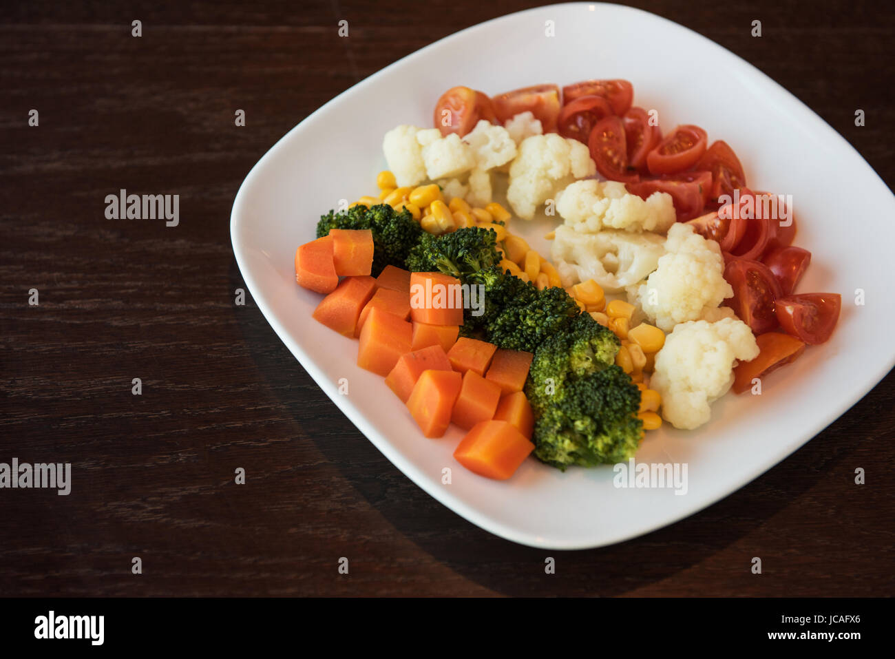 Boiled vegetables on plate Stock Photo - Alamy