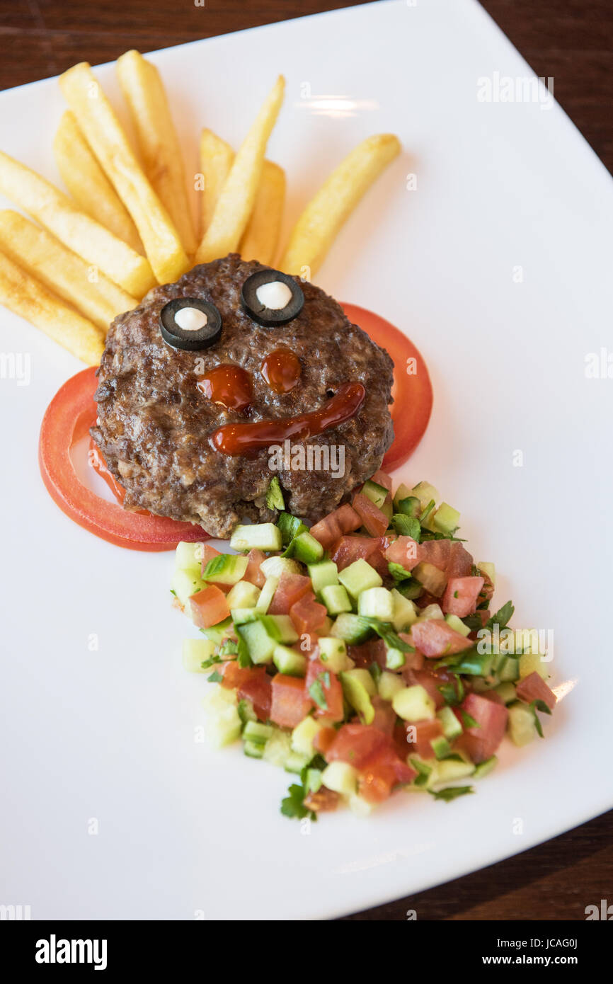 Funny meat cutlet face Stock Photo - Alamy