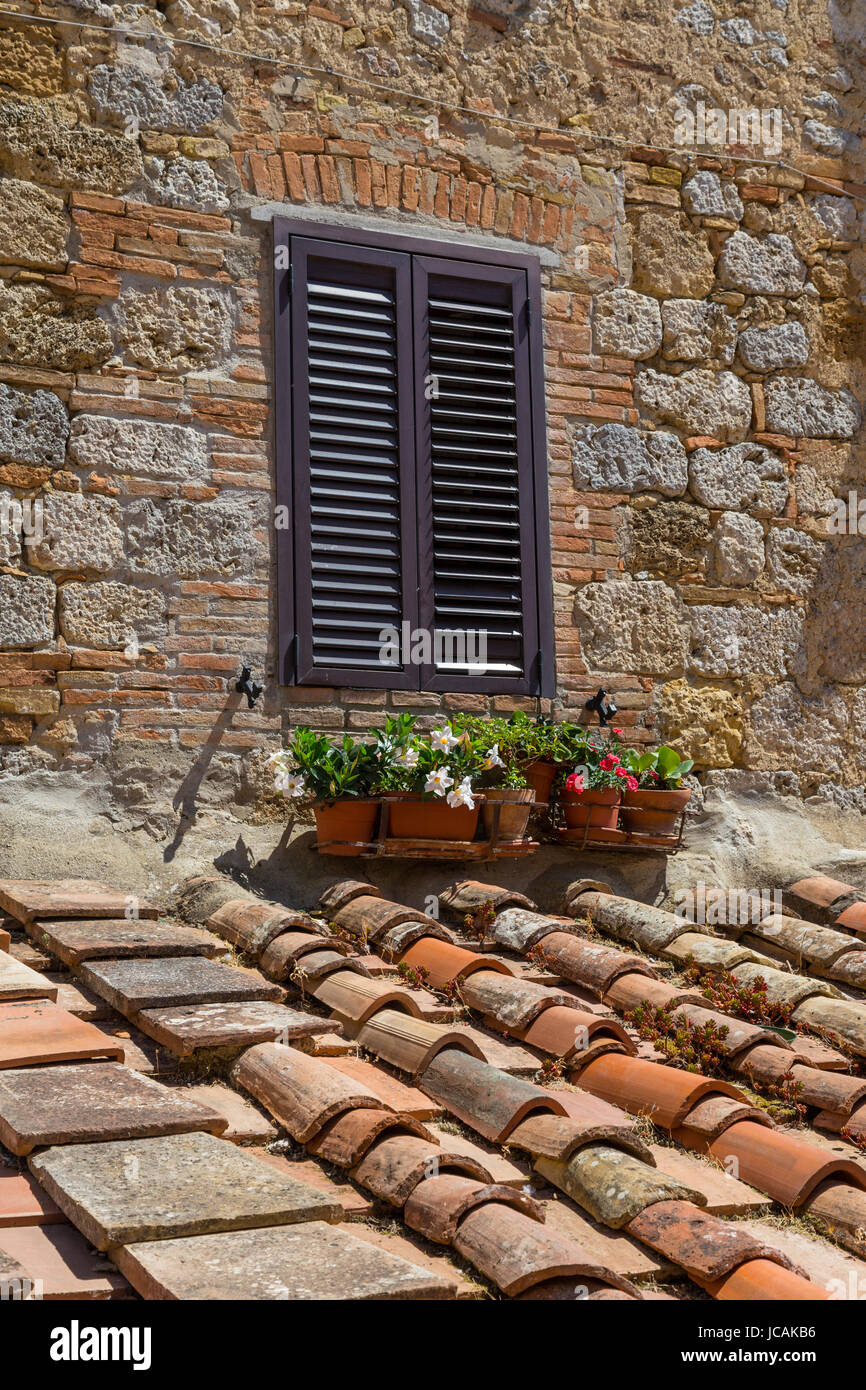 Window with shutter in Tuscany with flowers and brick Stock Photo - Alamy