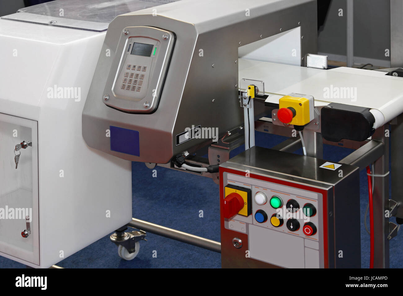 Metal detector at production line in food factory Stock Photo - Alamy