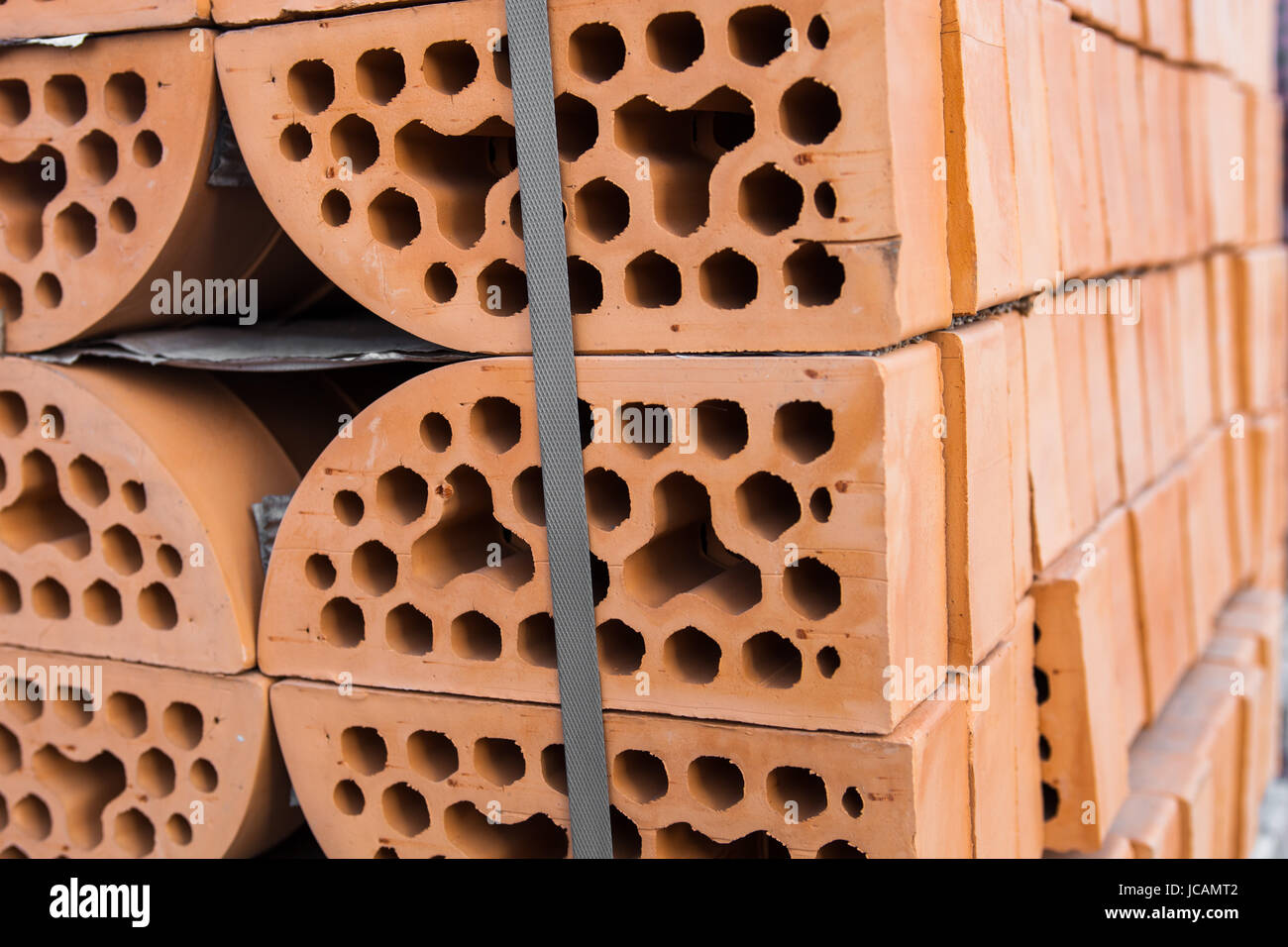 Stacks of silicate bricks with rounded edges Stock Photo - Alamy