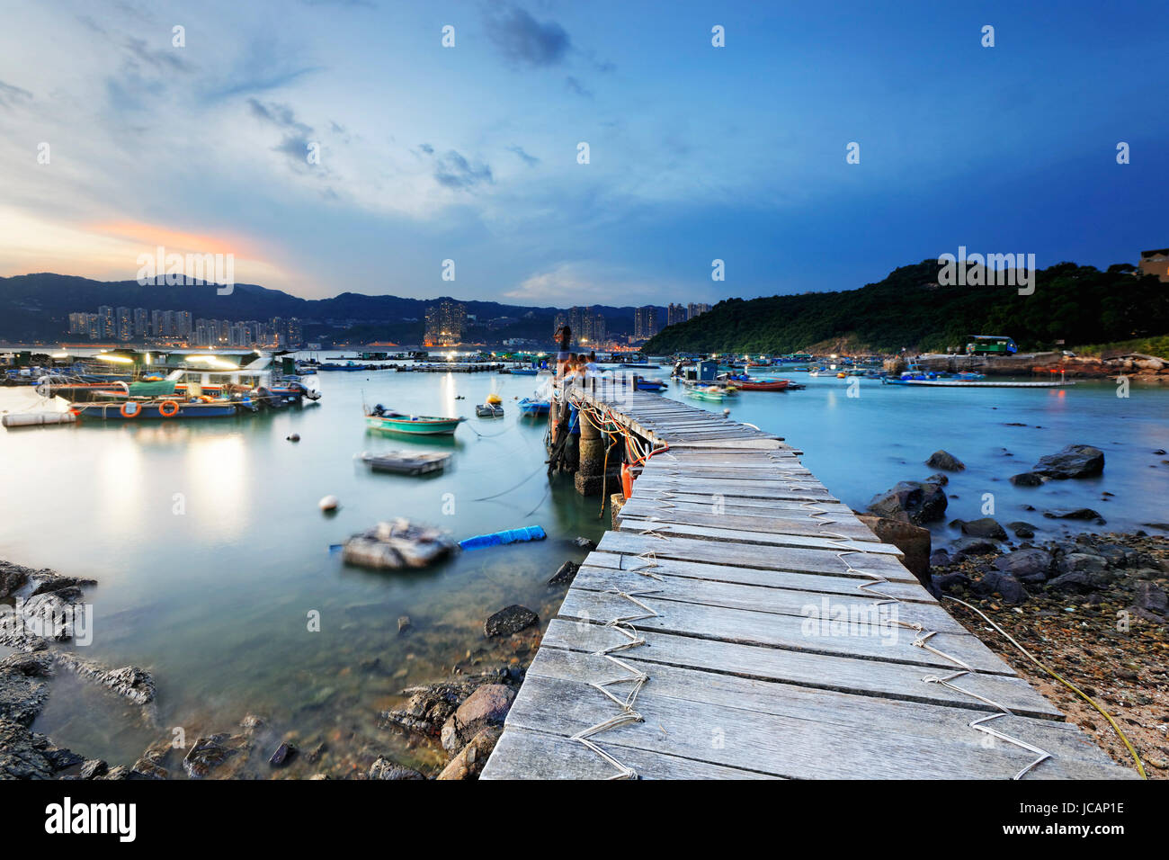 Boat pier at sunset. Beautiful landscape Stock Photo - Alamy