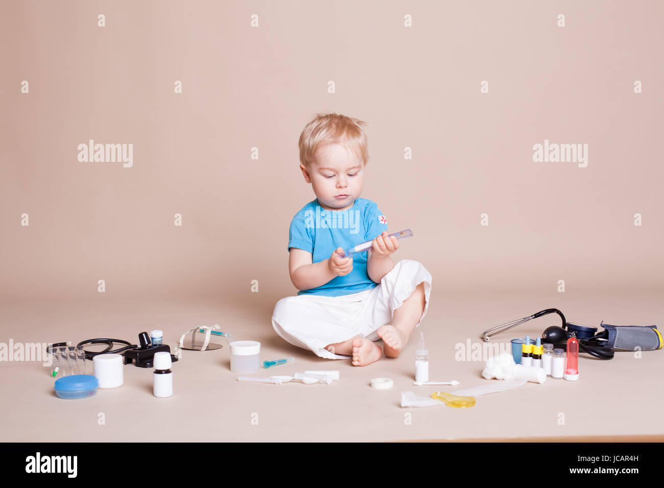 Boy playing in the doctor in the hospital 1 Stock Photo - Alamy
