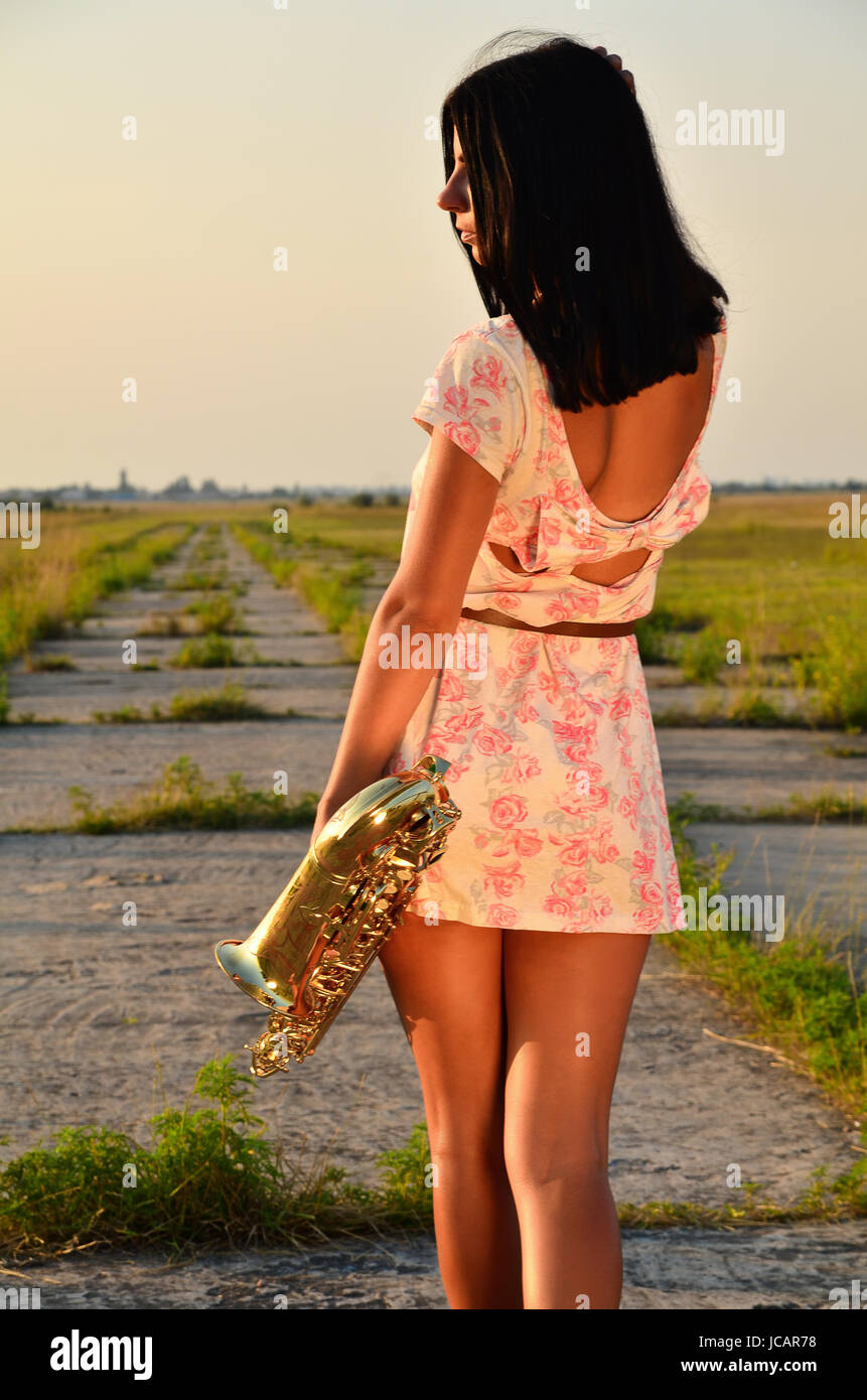 Saxophone female hi-res stock photography and images - Alamy