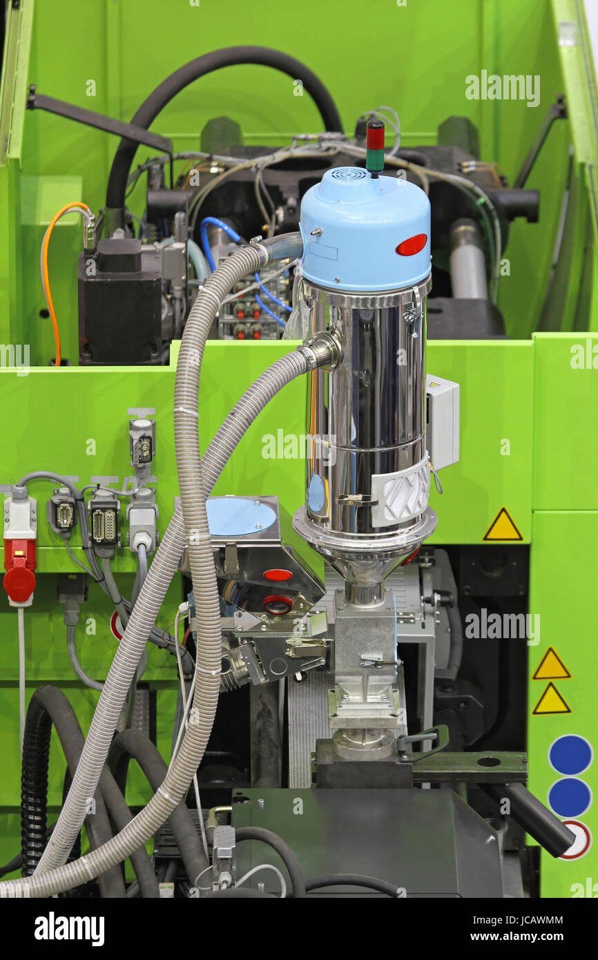Injection moulding machine for plastic parts production Stock Photo - Alamy