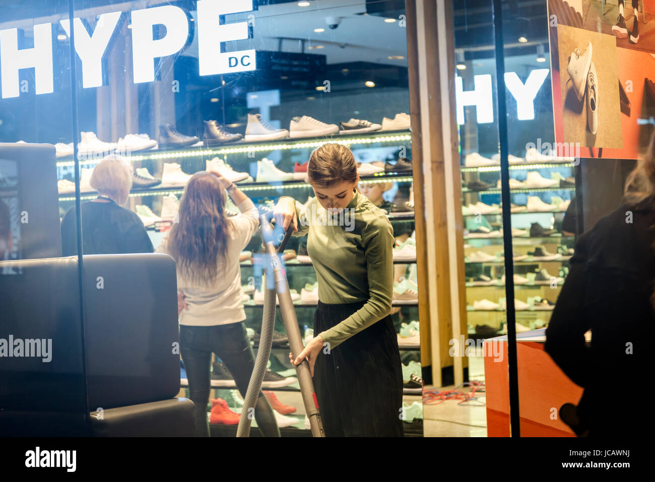 Woman shoe assistant hi-res stock photography and images - Alamy