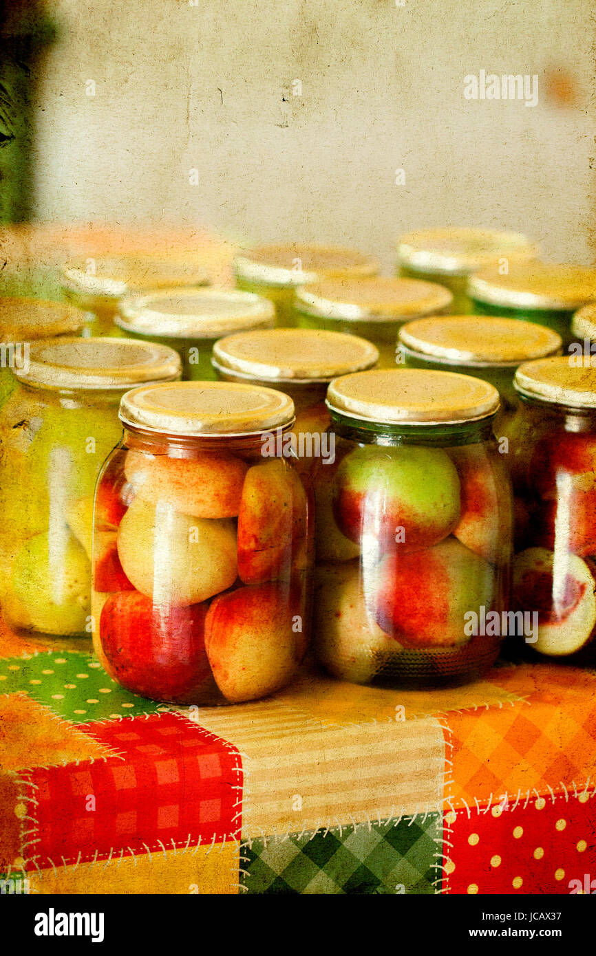 Jars of homemade fruit preserves - peach compote Stock Photo - Alamy