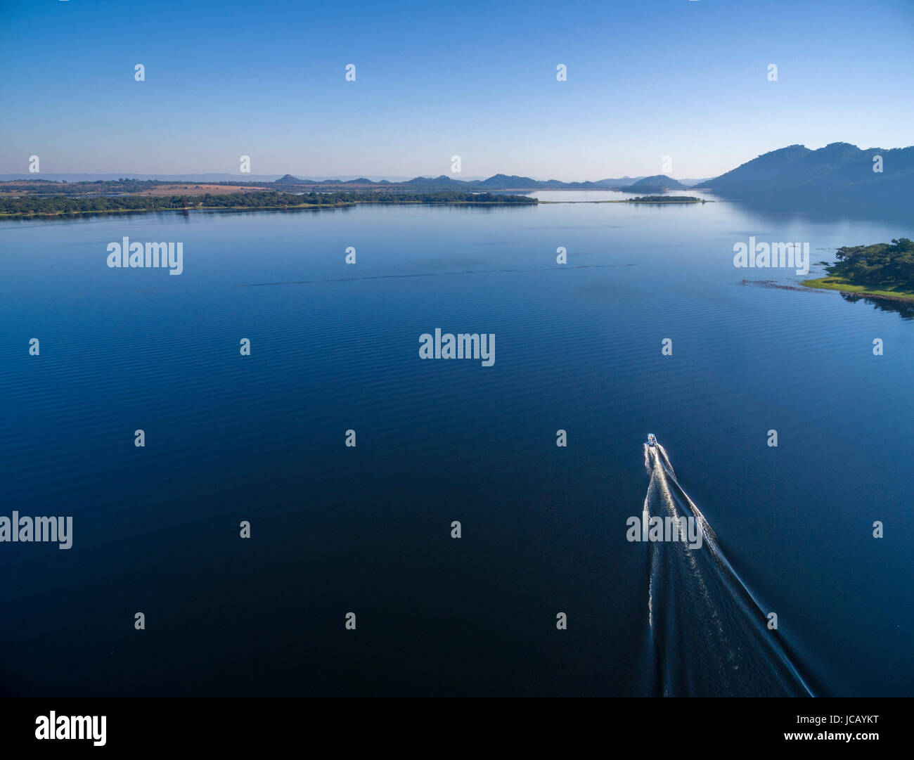 A speedboat seen at Mazvikadei dam in Zimbabwe Stock Photo - Alamy