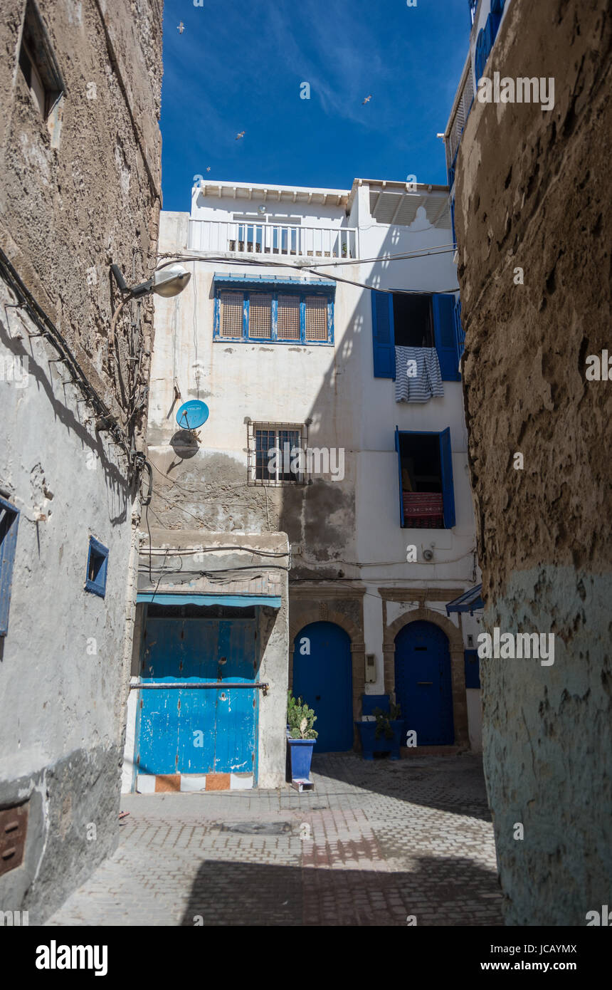 Narrow street and colorful old houses of medieval medina of Essaouira ...