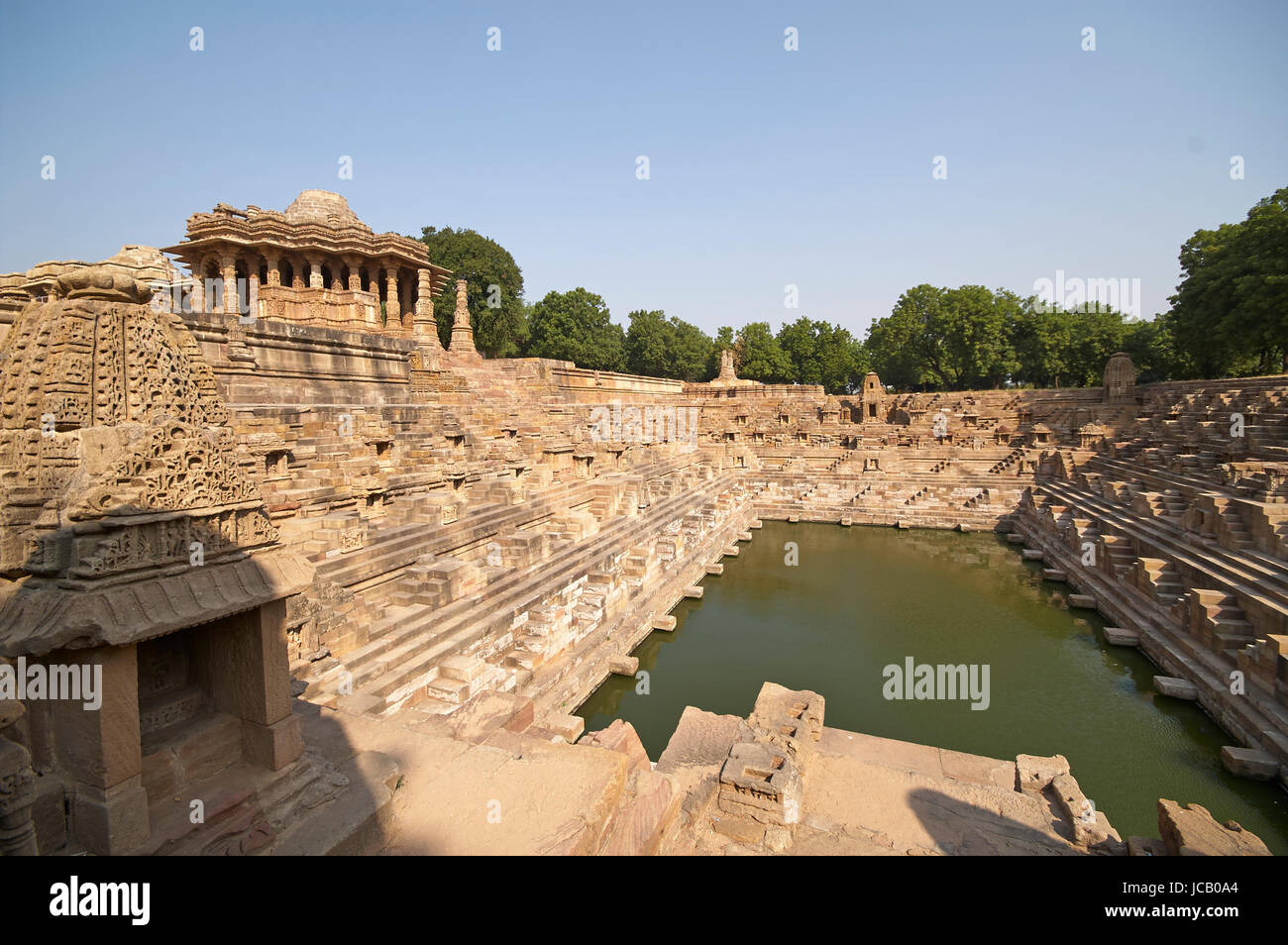 Ancient stepped water tank in front of the Sun Temple at Modhera ...