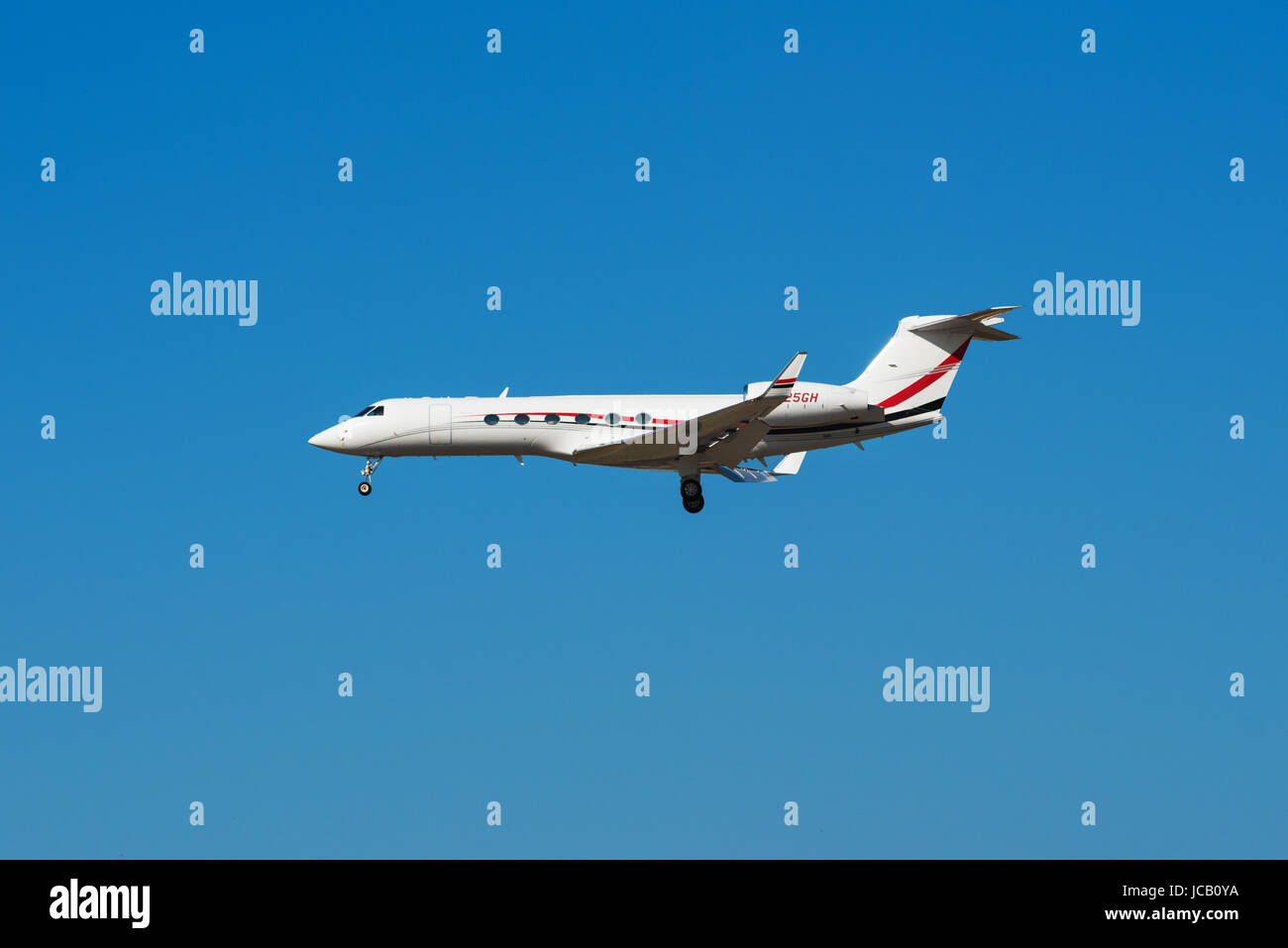 Madrid, Spain - May 22, 2017: Private Jet is landing in Madrid Barajas ...