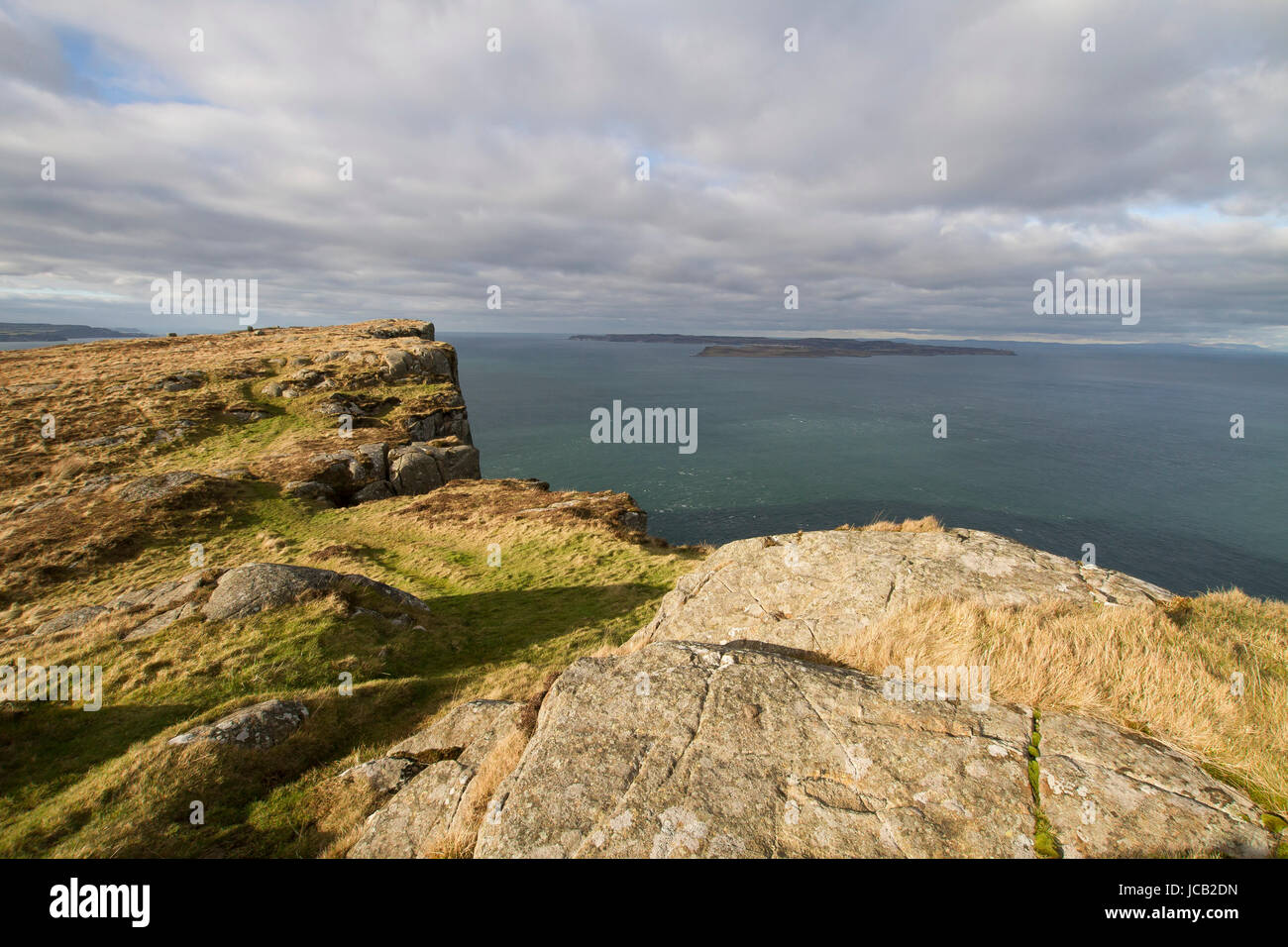 Cliff at Fair Head, County Antrim, Northern Ireland with Rathlin Island ...